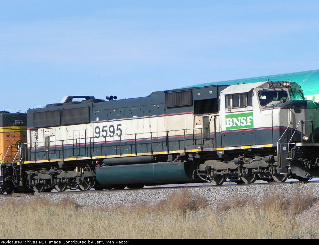 I posted this picture, not because its a good picture, which it isn't, but because of the BNSF ...